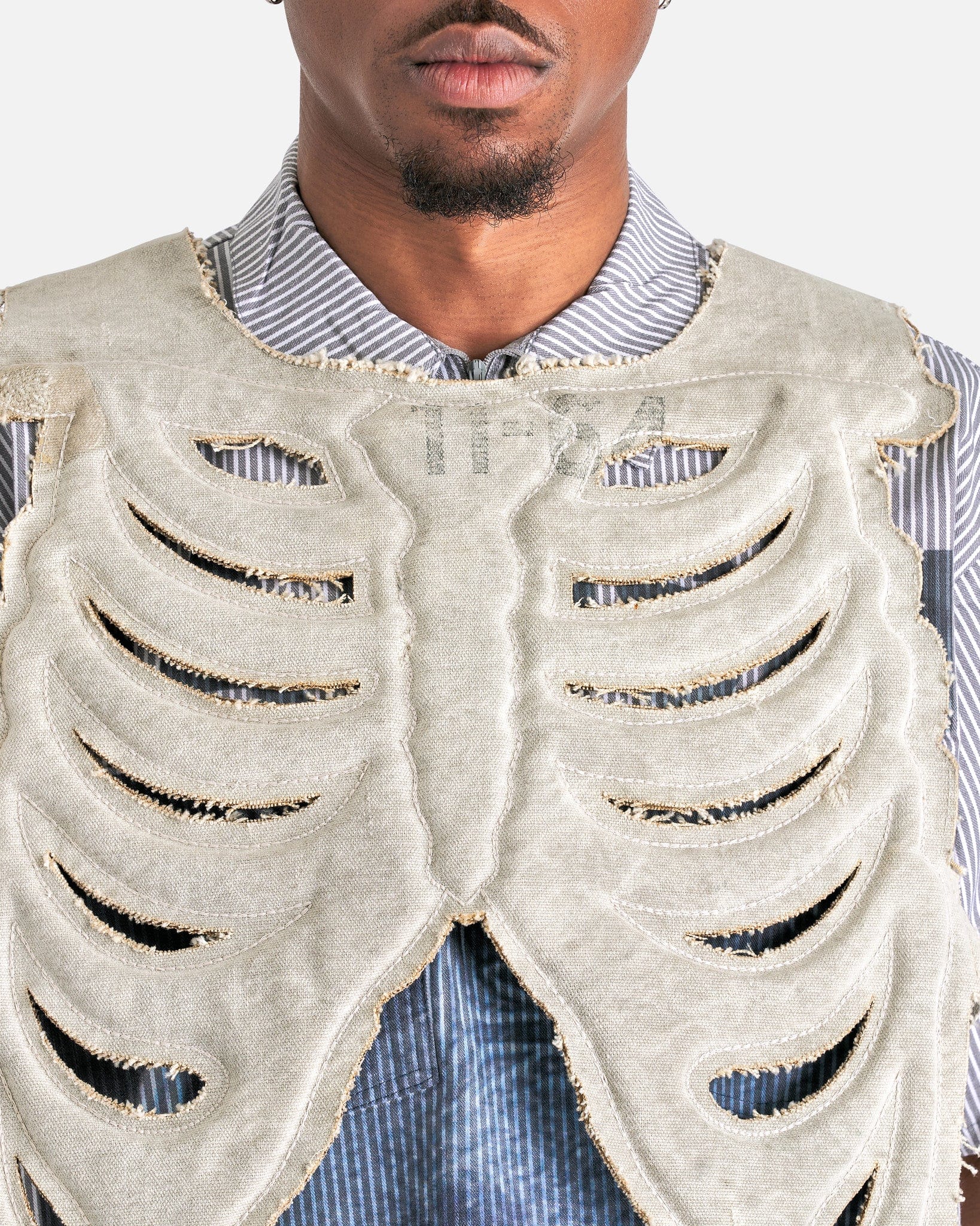 Satoshi Nakamoto - Ribcage Moto Vest in Beige – SVRN Satoshi Nakamoto - Ribcage Moto Vest in Beige – SVRN